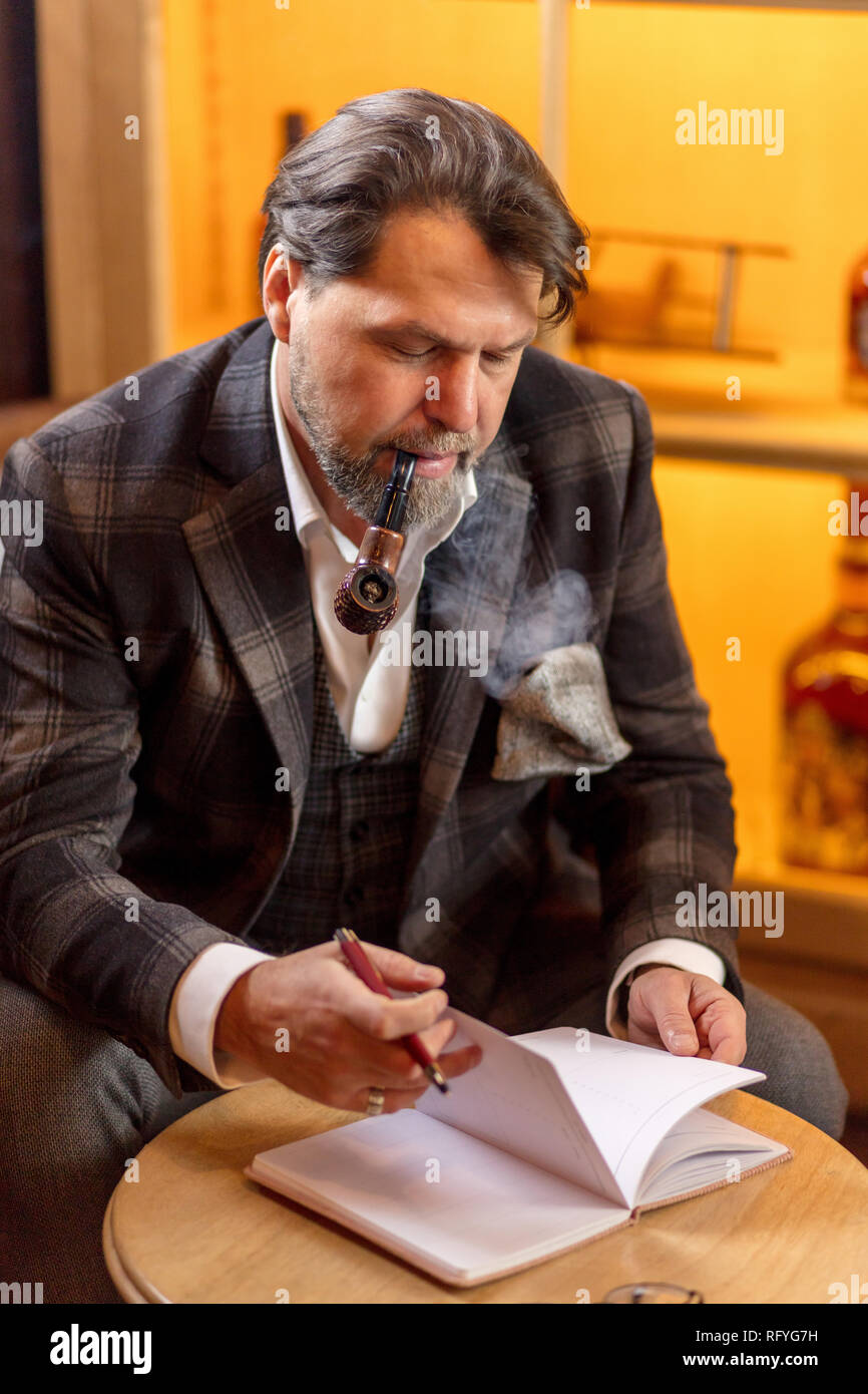 Businessman sitting desk making paper hi-res stock photography and ...