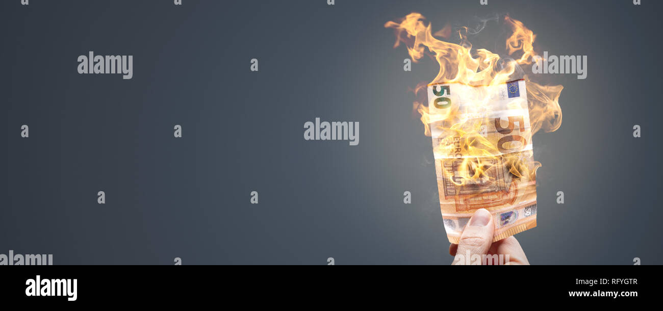 Burning money hi-res stock photography and images - Alamy