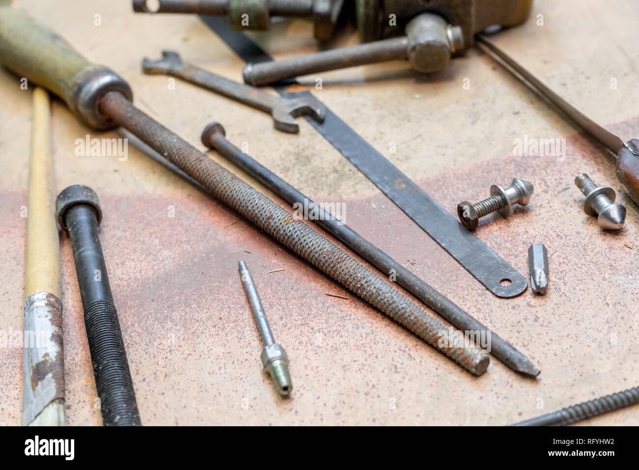 old working tools on painted wooden rustic background, select focus ...