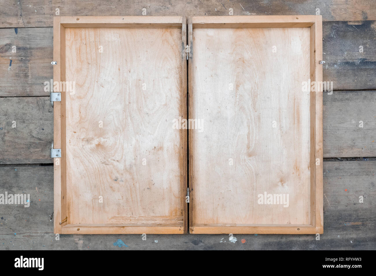 wooden case, casket, open vintage flat chest on wooden table top view ...
