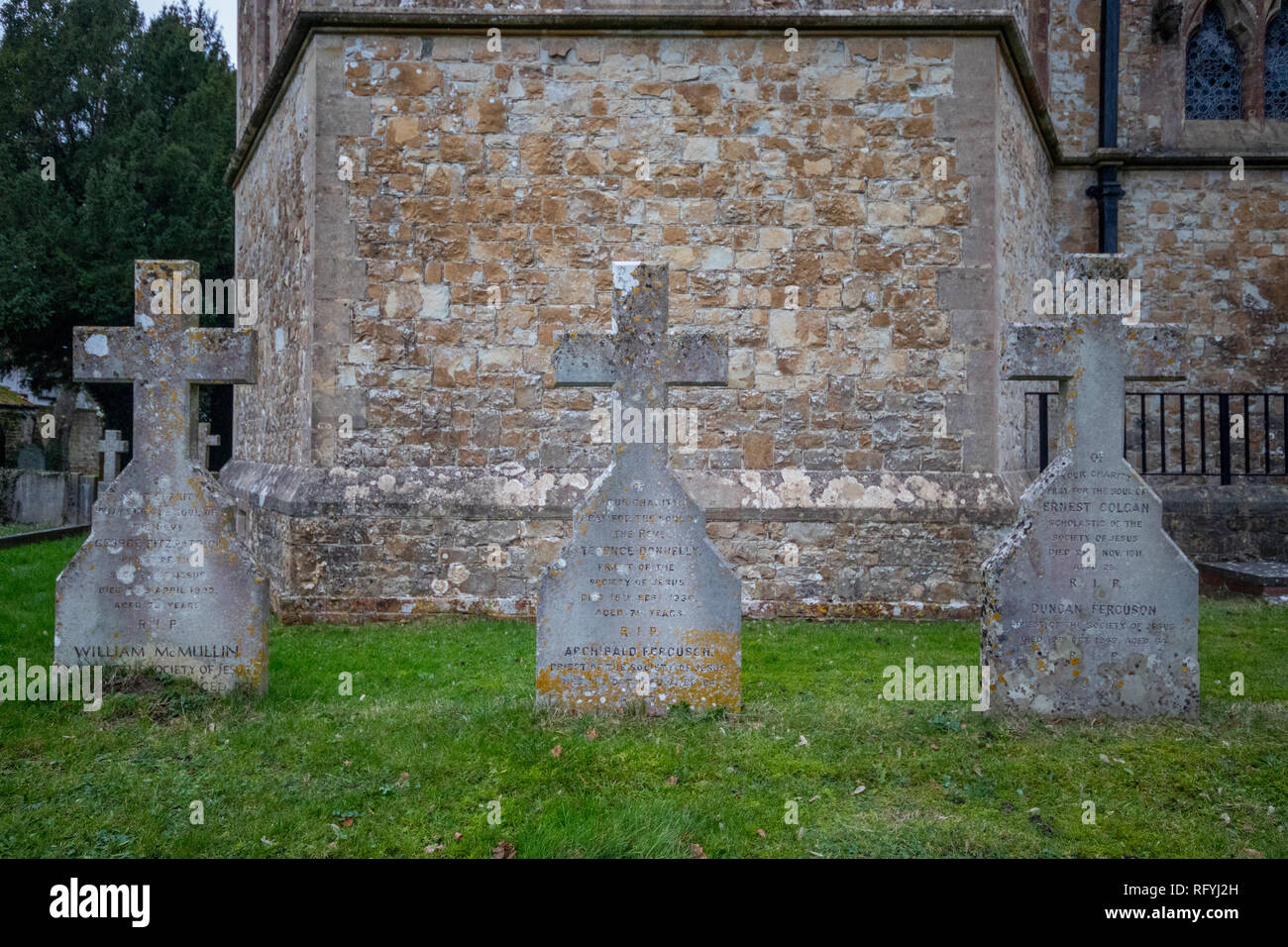 Headstones in the graveyard at the Church of St Anthony and St George ...
