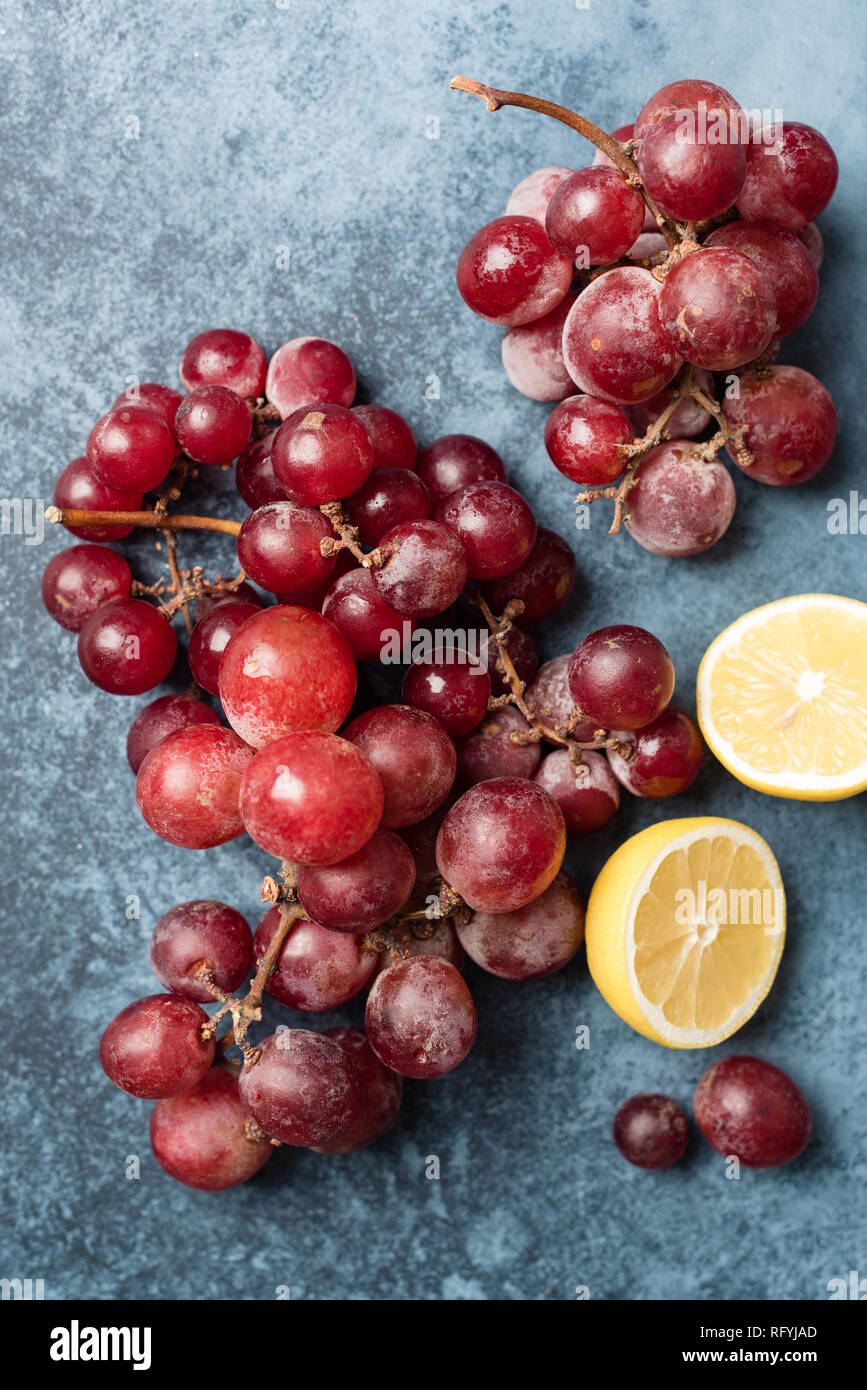 Wine and grape on wooden background Stock Photo - Alamy
