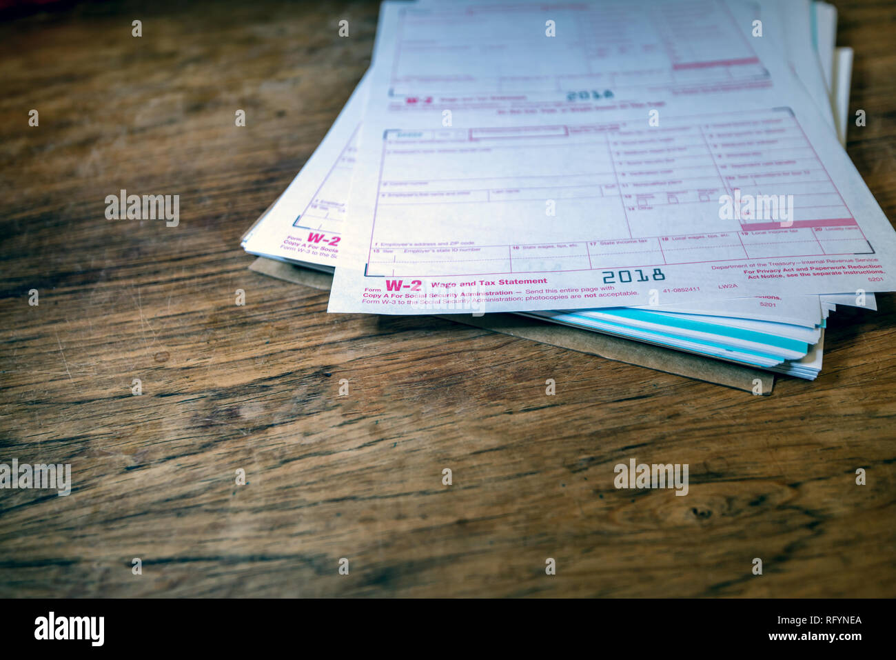 USA IRS W-4 tax forms lying on a table ready to be filled out Stock ...