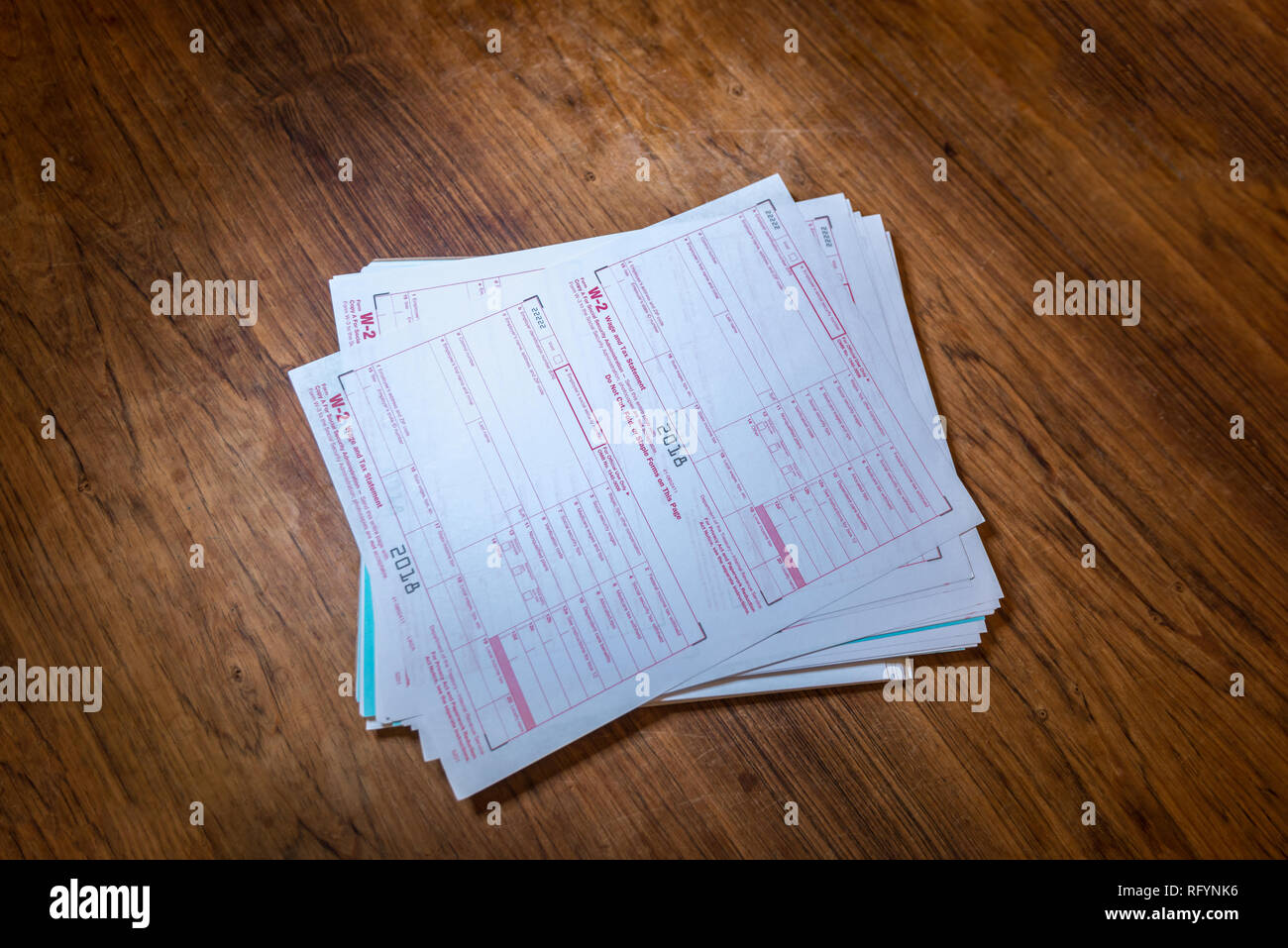 USA IRS W-4 tax forms lying on a table ready to be filled out Stock ...