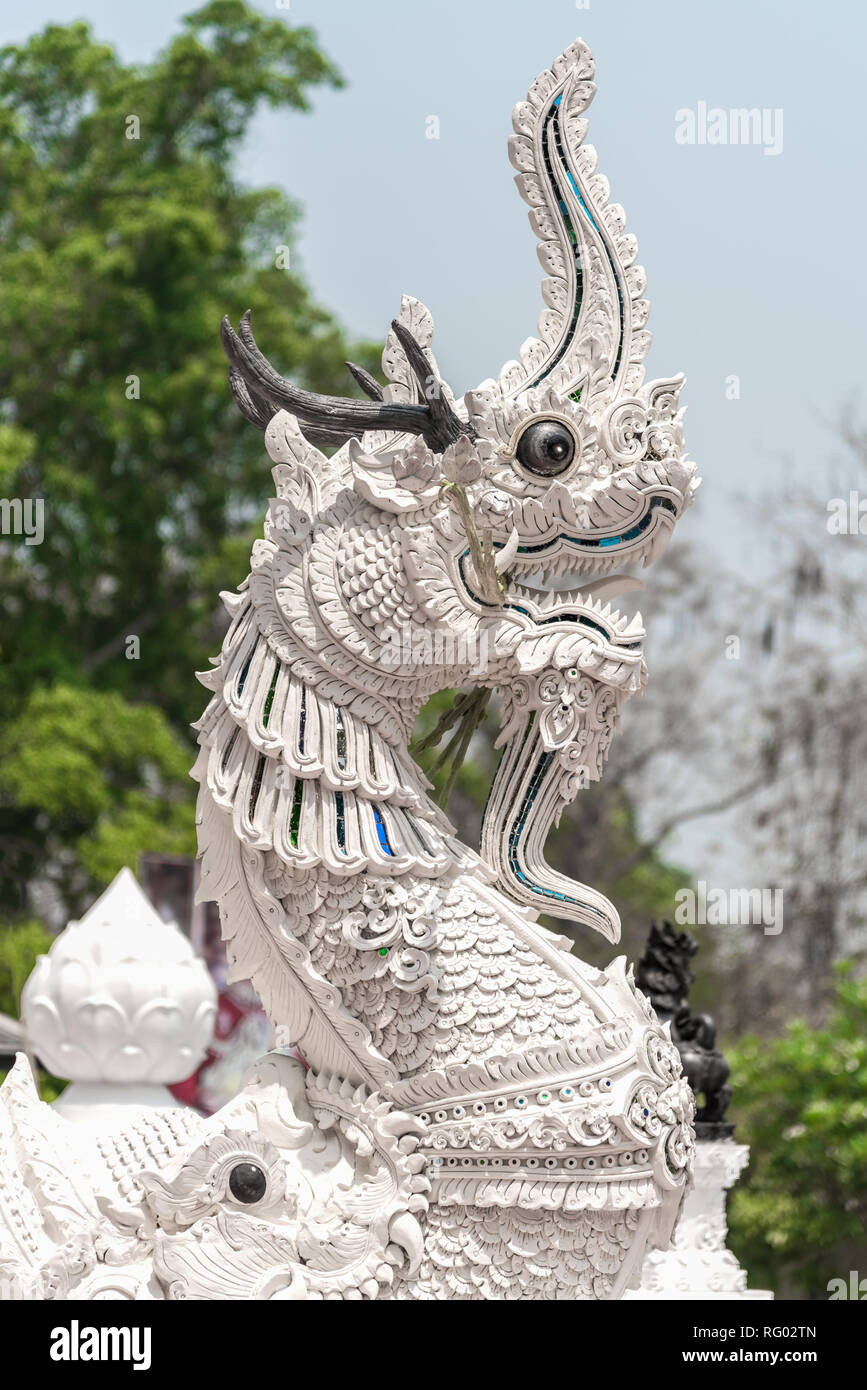statue of white serpent in the temple with blue sky background Stock ...
