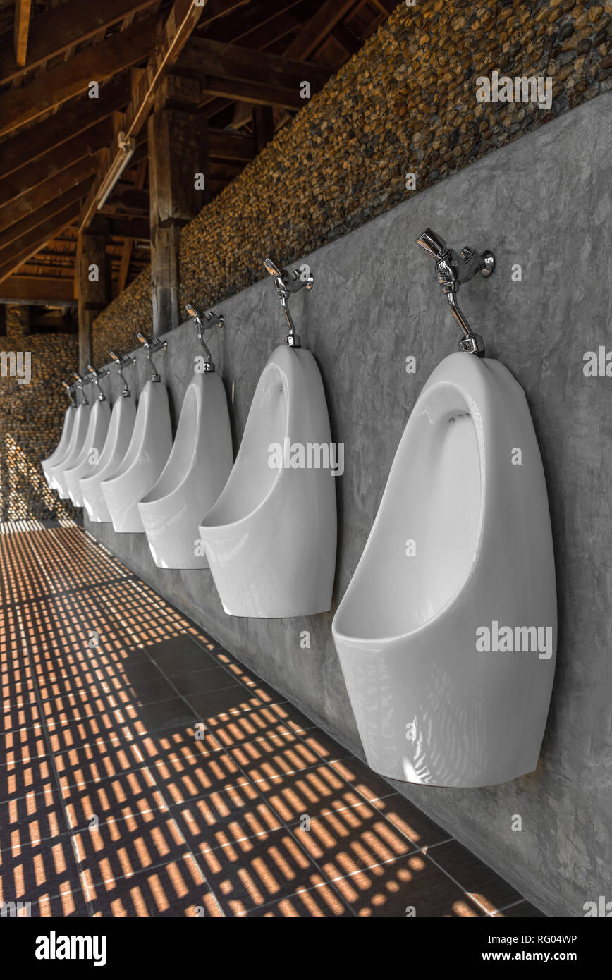 Row of outdoor urinals men public toilet Stock Photo - Alamy