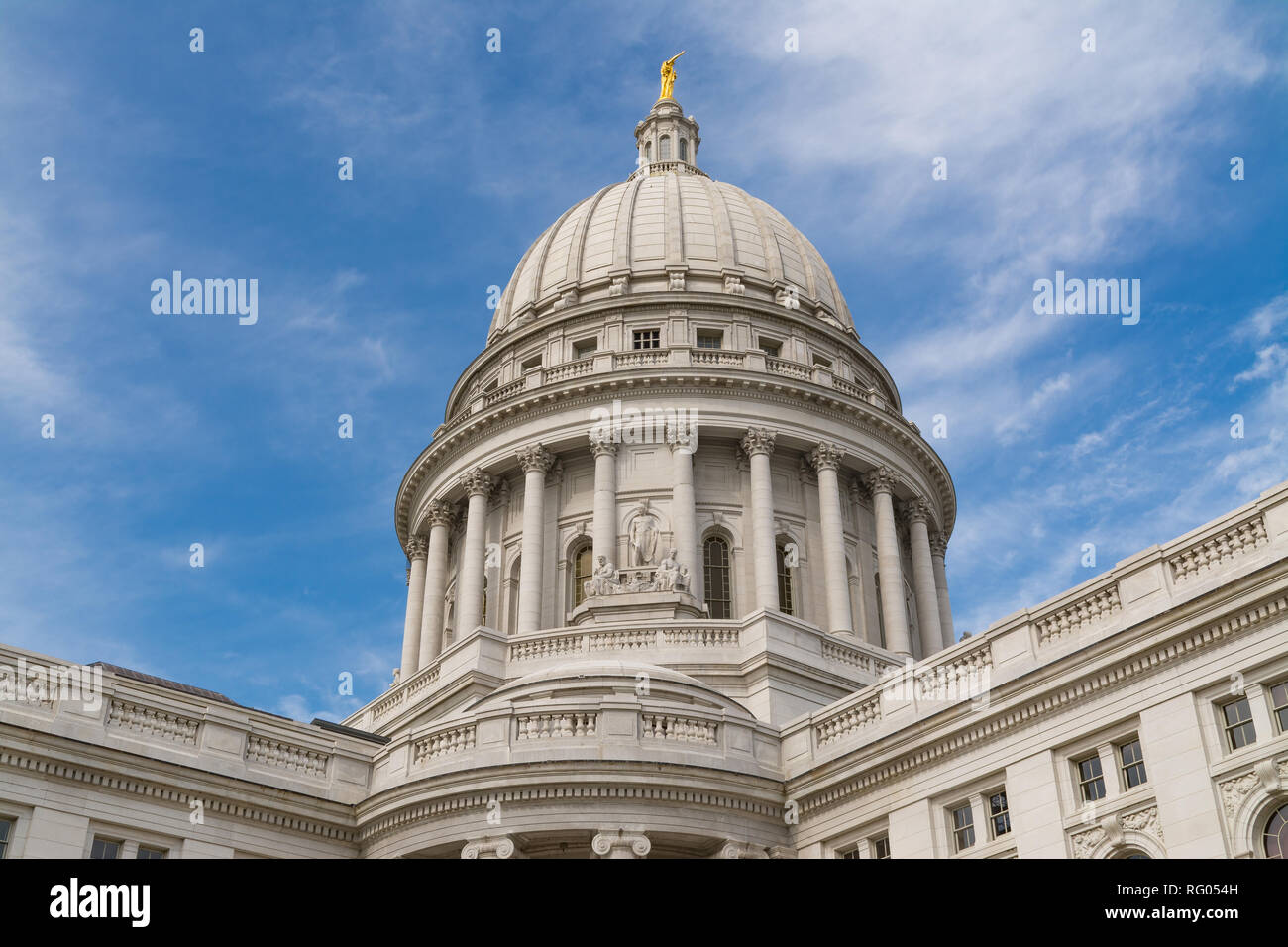 Wisconsin State Capitol building with blue skies and clouds in ...