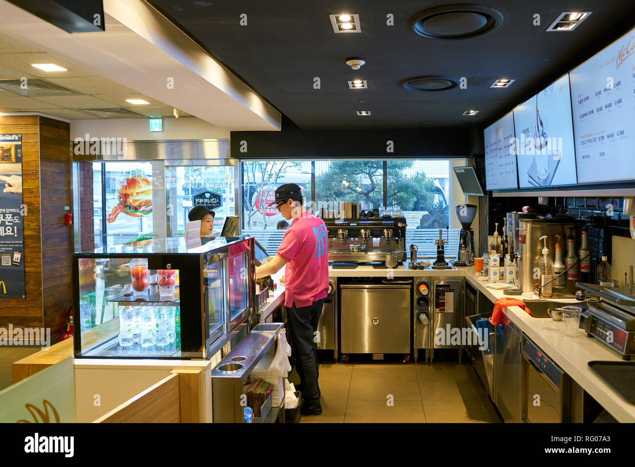 SEOUL, SOUTH KOREA - CIRCA MAY, 2017: worker at McCafe. McCafe is a ...