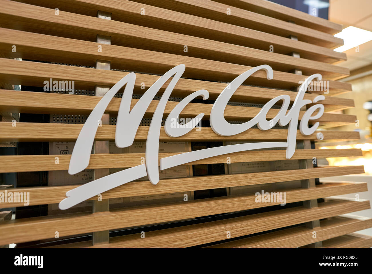 SEOUL, SOUTH KOREA - CIRCA MAY, 2017: close up shot of McCafe sign ...
