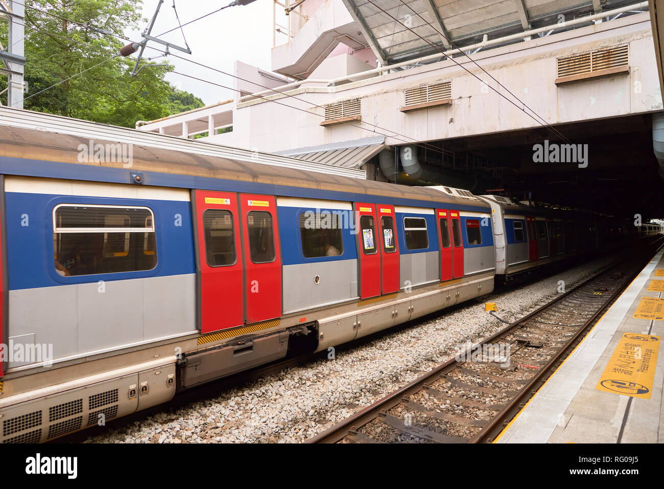 HONG KONG - SEPTEMBER 02, 2016: an MTR train on the East Rail Line. The ...