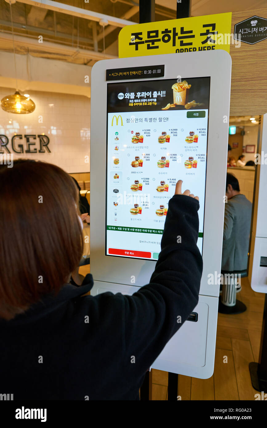 SEOUL, SOUTH KOREA - CIRCA MAY, 2017: woman use McDonald's ordering ...