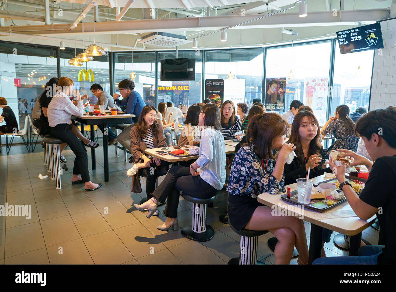 SEOUL, SOUTH KOREA - CIRCA MAY, 2017: people eat at McDonald's ...