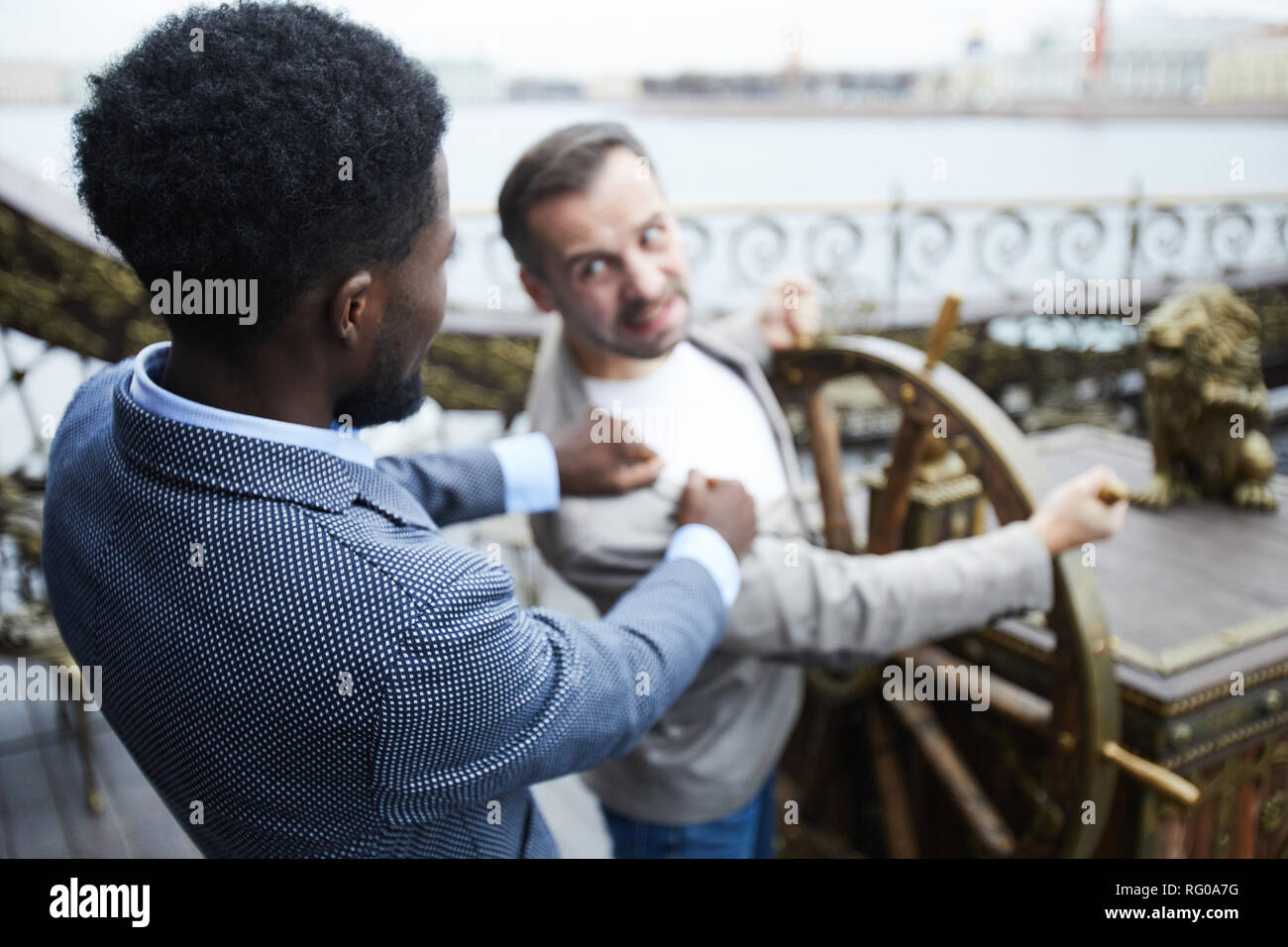Steering wheel the helm fight hi-res stock photography and images - Alamy