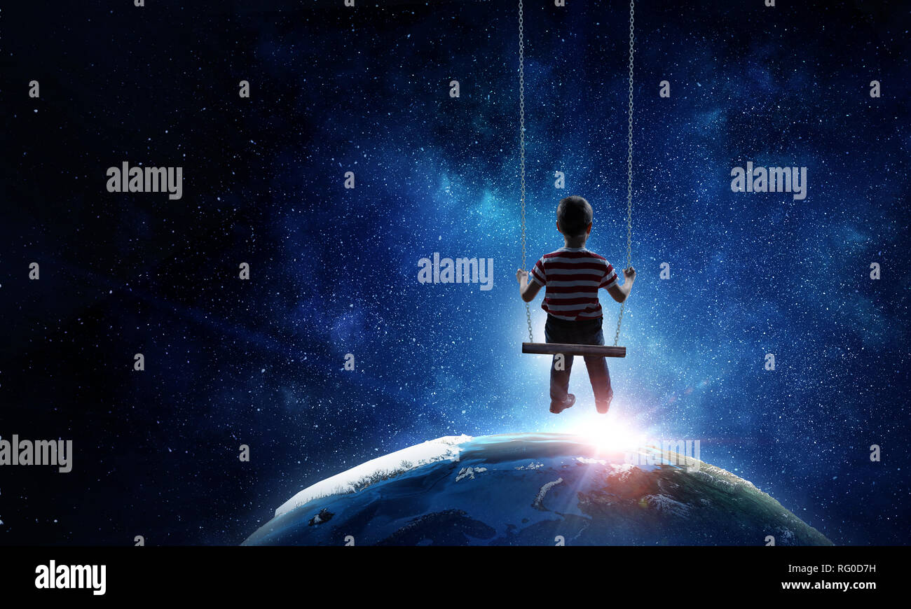 Cute little girl riding on swing. Elements of this image are furnished ...