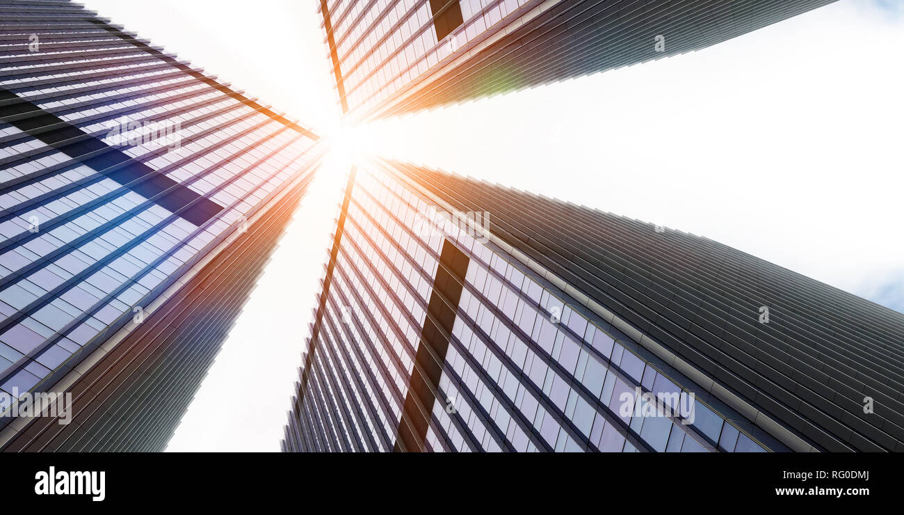 Bottom angle view of glass blue building Stock Photo - Alamy