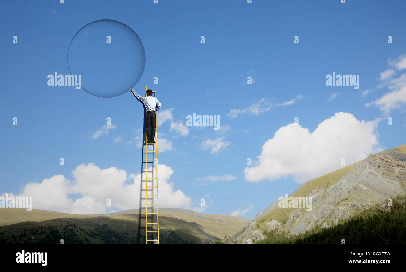 Businessman standing on ladder and climbing up to window. Mixed media ...