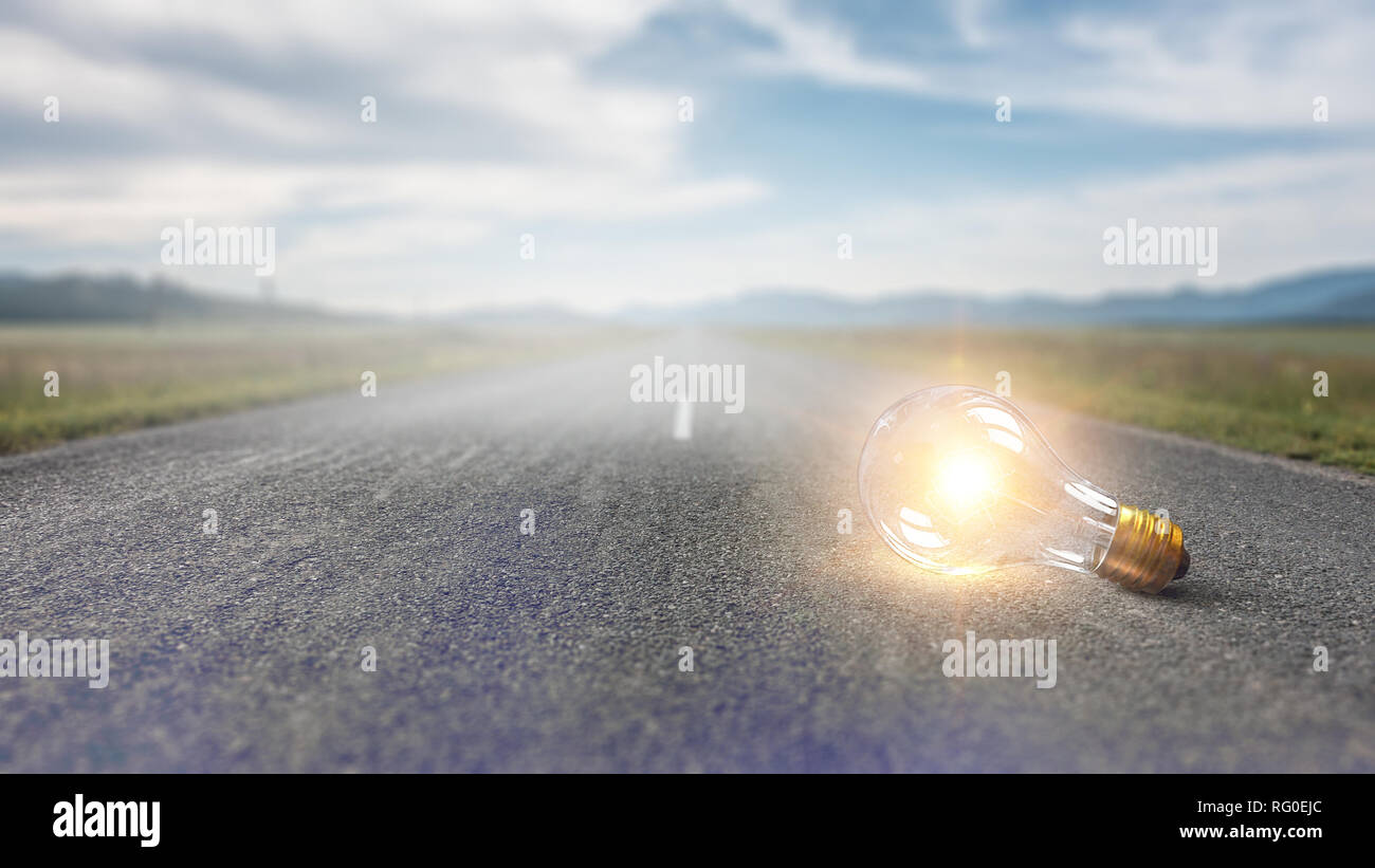 Glass glowing bulb outdoor lying on ground Stock Photo - Alamy