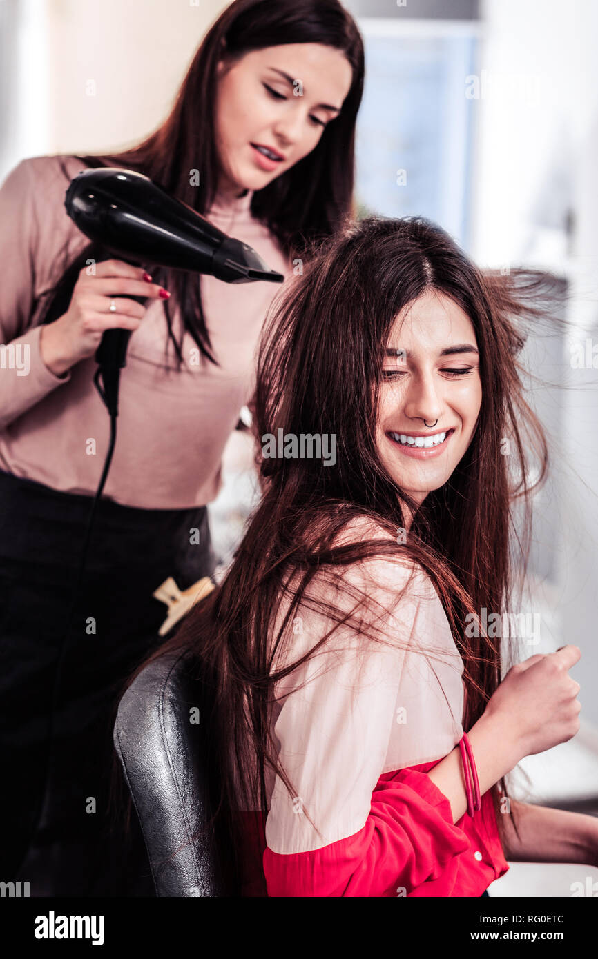 Attractive female millennial turning head hi-res stock photography and ...