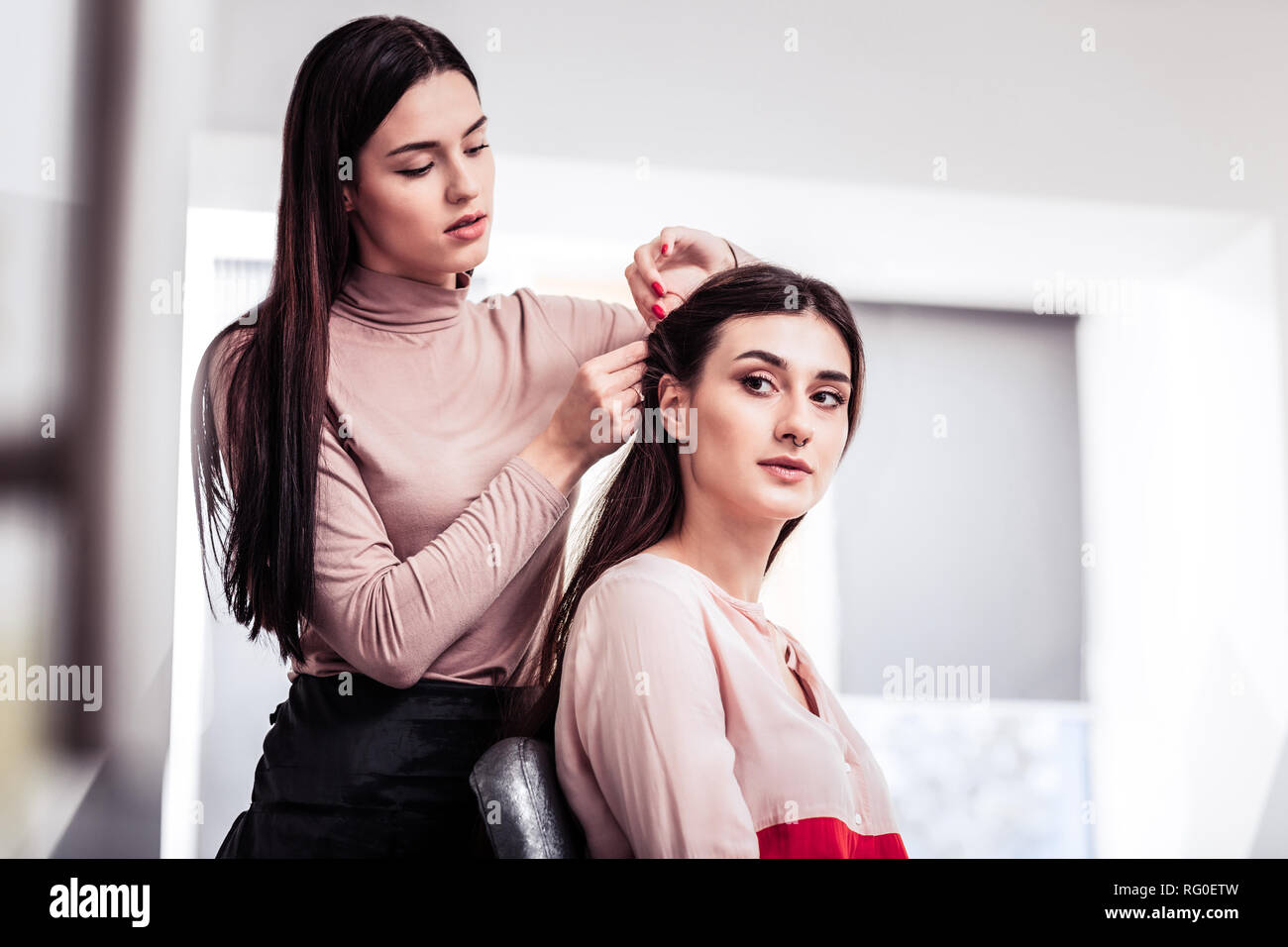 Woman having hair done hi-res stock photography and images - Alamy