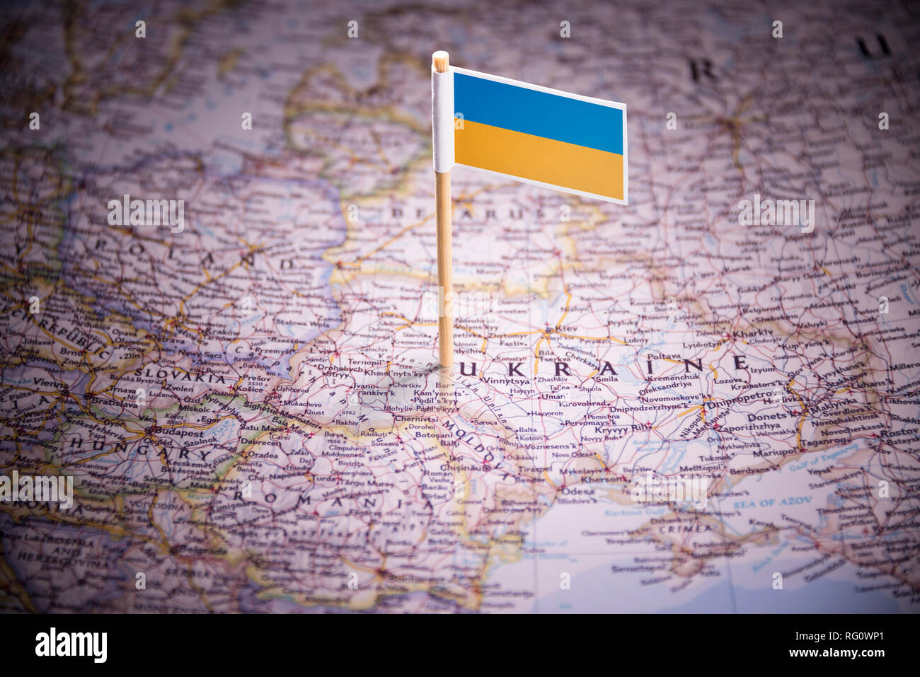 Ukraine marked with a flag on the map Stock Photo - Alamy