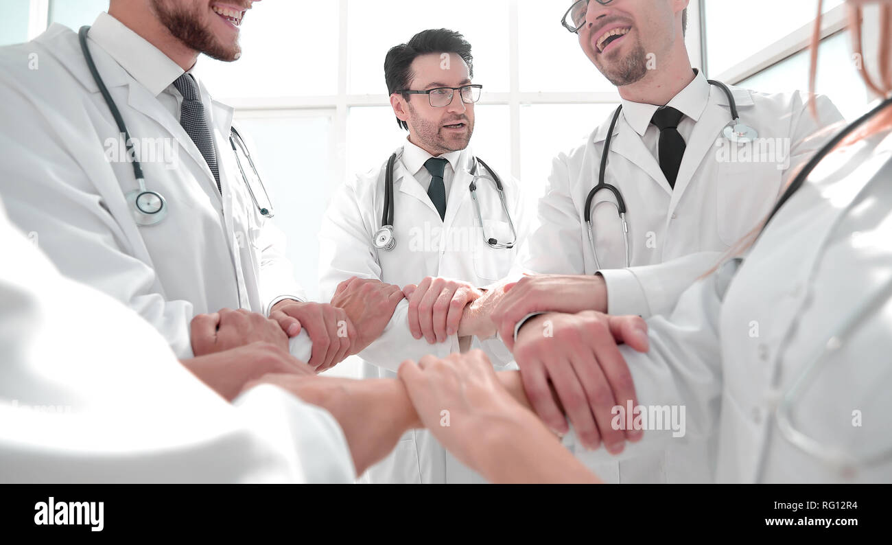 close up.a group of doctors standing in a circle Stock Photo - Alamy