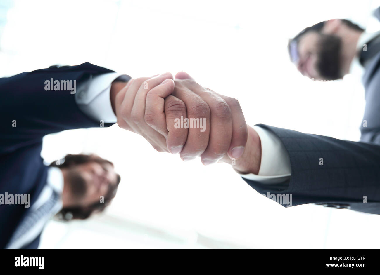 Two business people are holding hands to business cooperation Stock ...