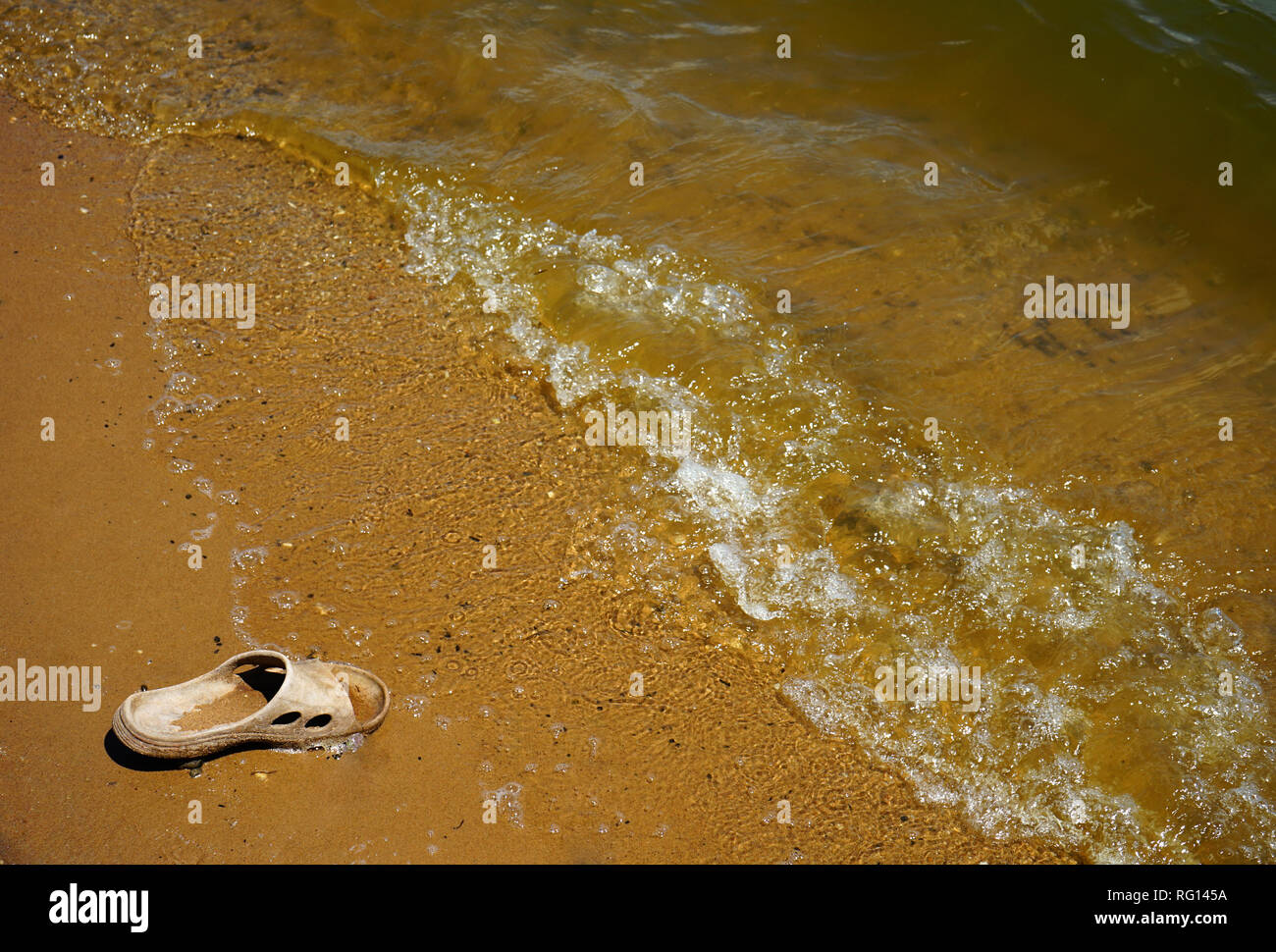 Plastic waste on beach Stock Photo - Alamy