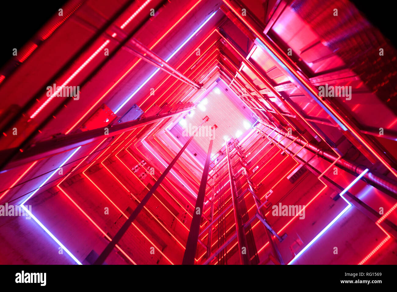 Colorful illumination in a glass elevator Stock Photo - Alamy