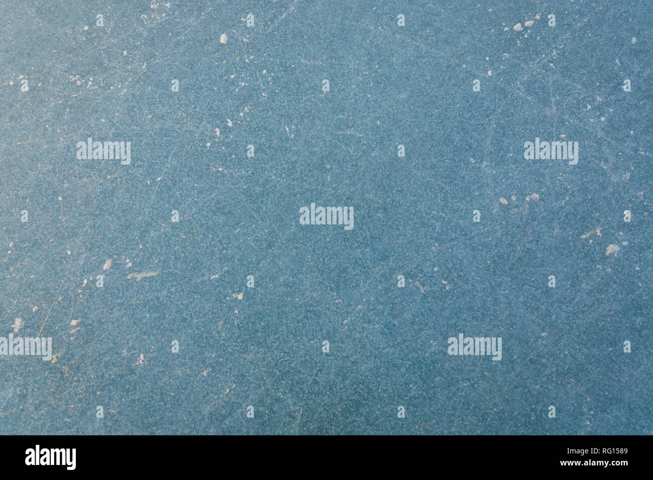Light blue ice texture with skate scratches Stock Photo - Alamy