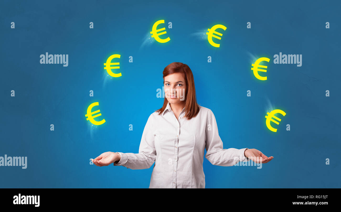Young happy person juggle with euro symbol Stock Photo - Alamy