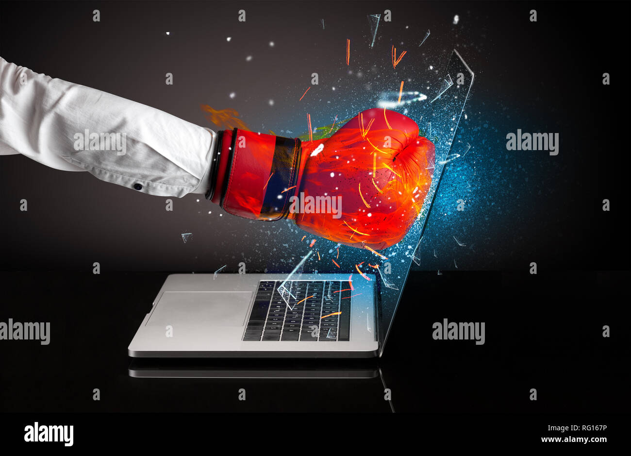 Firing hand hitting strongly laptop screen glass Stock Photo - Alamy