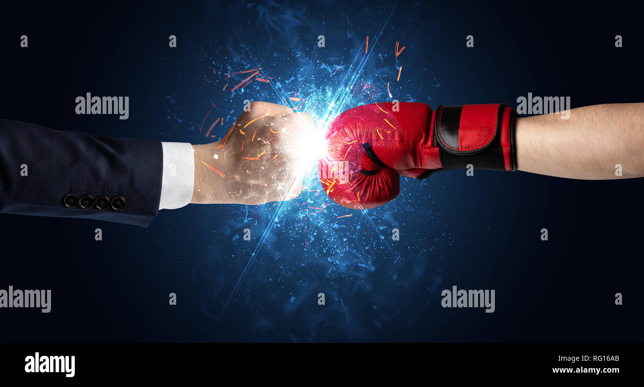 Two hands fighting with light, glow, spark and smoke concept Stock ...