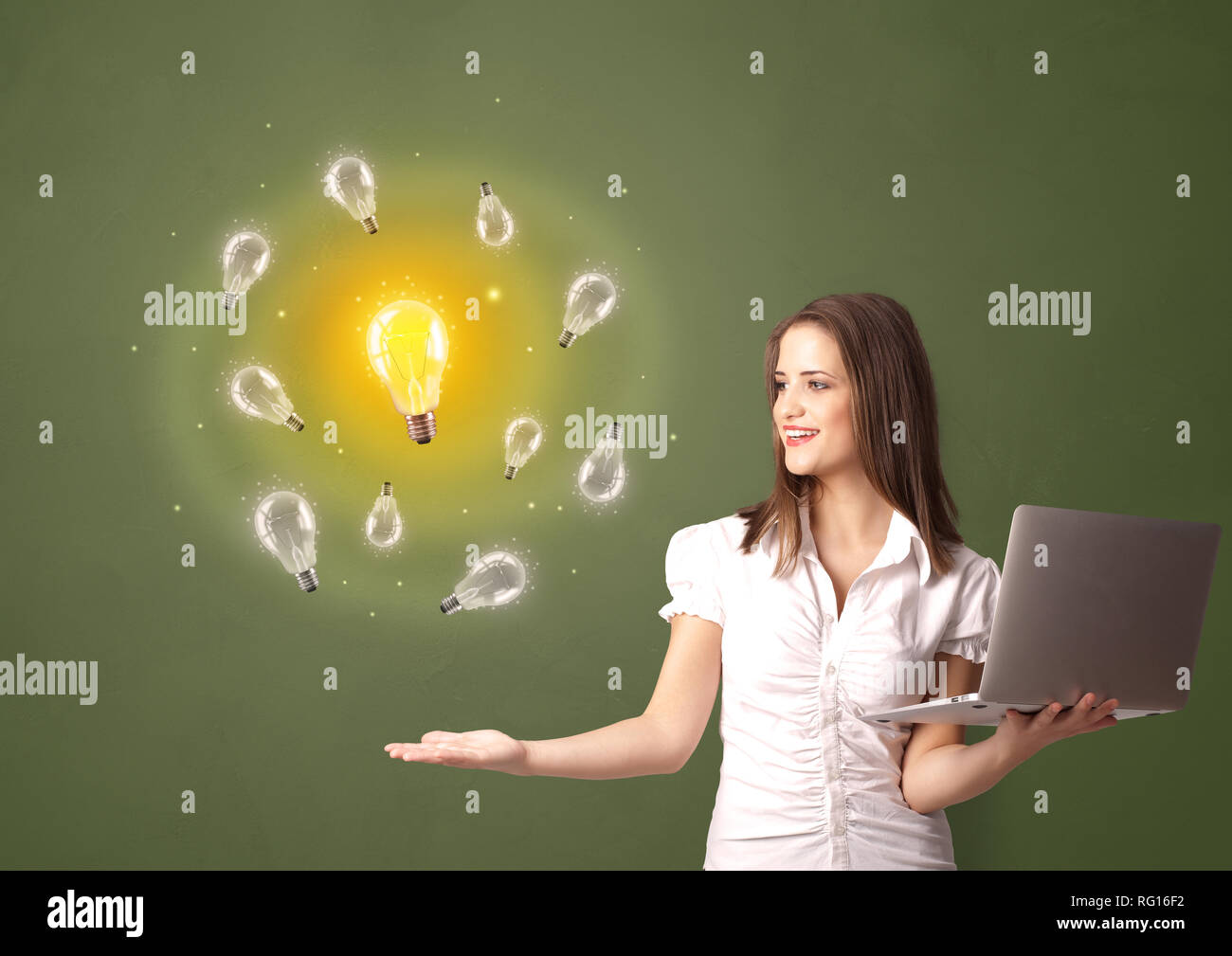 Young smiling person presenting new idea concept Stock Photo - Alamy