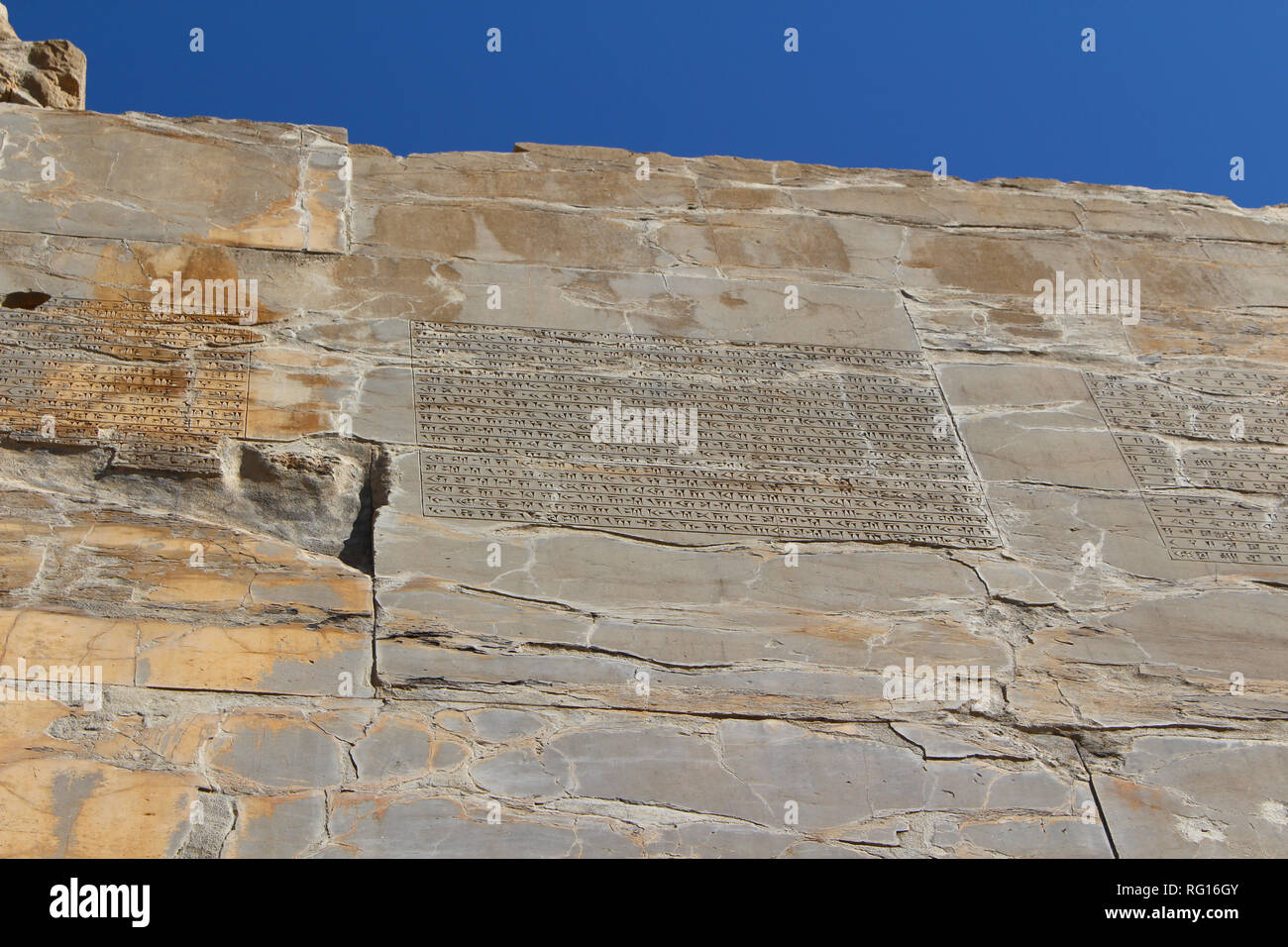 Writings in cuneiform on the walls of Persepolis, Iran Stock Photo - Alamy