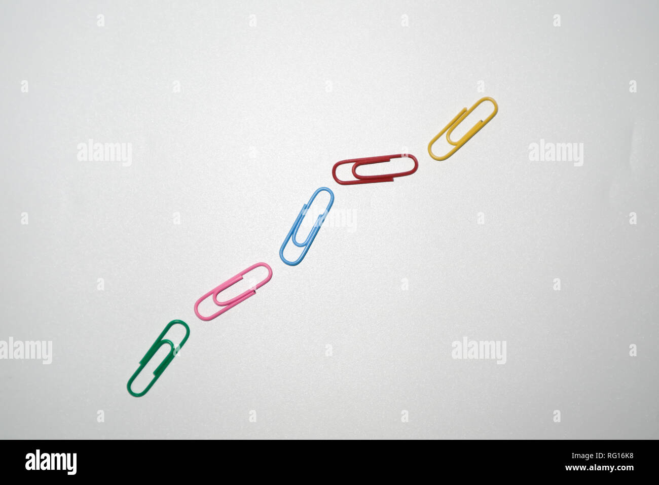 progressive sign in colorful clips Stock Photo - Alamy