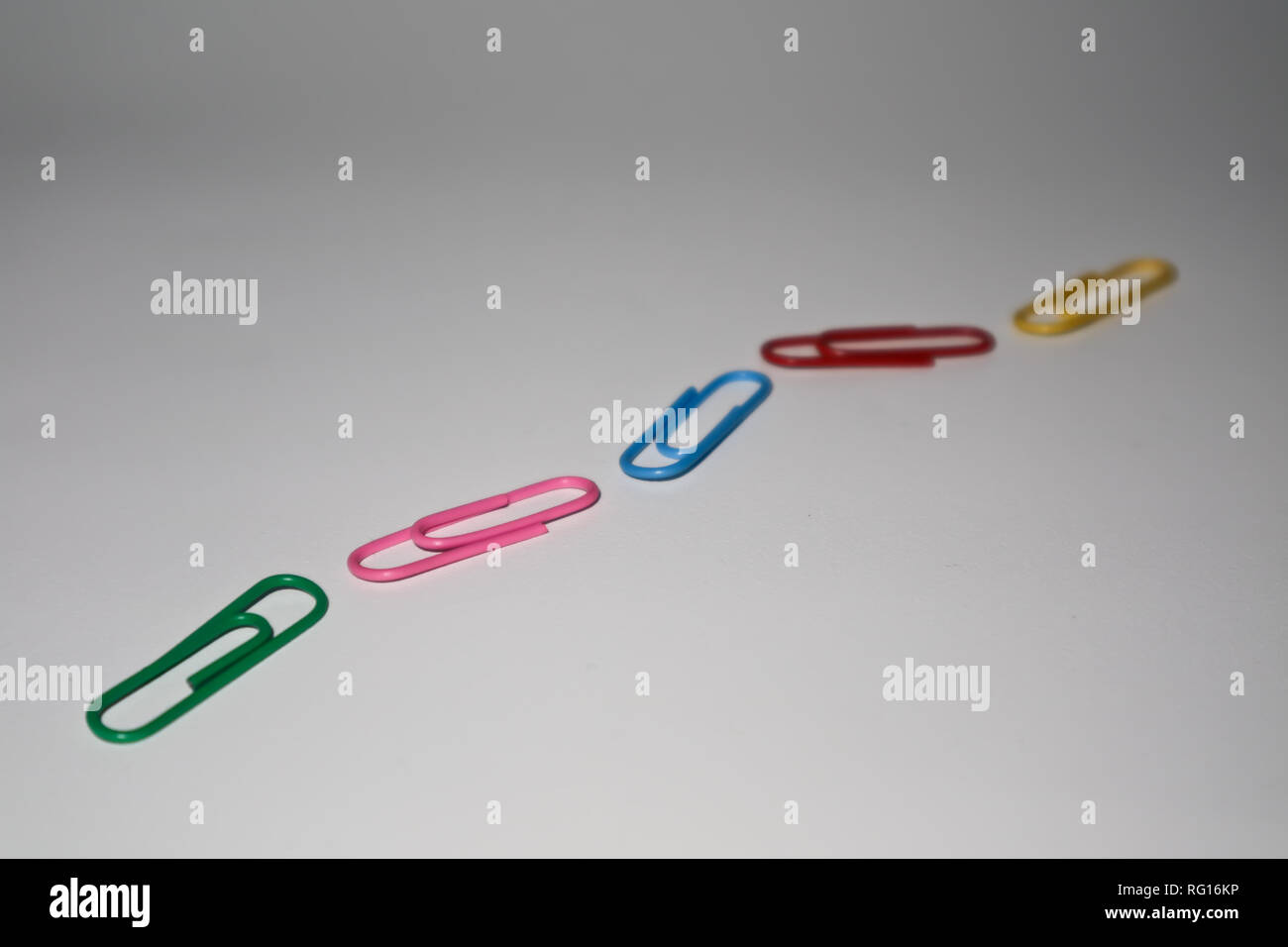 progressive sign in colorful clips Stock Photo - Alamy