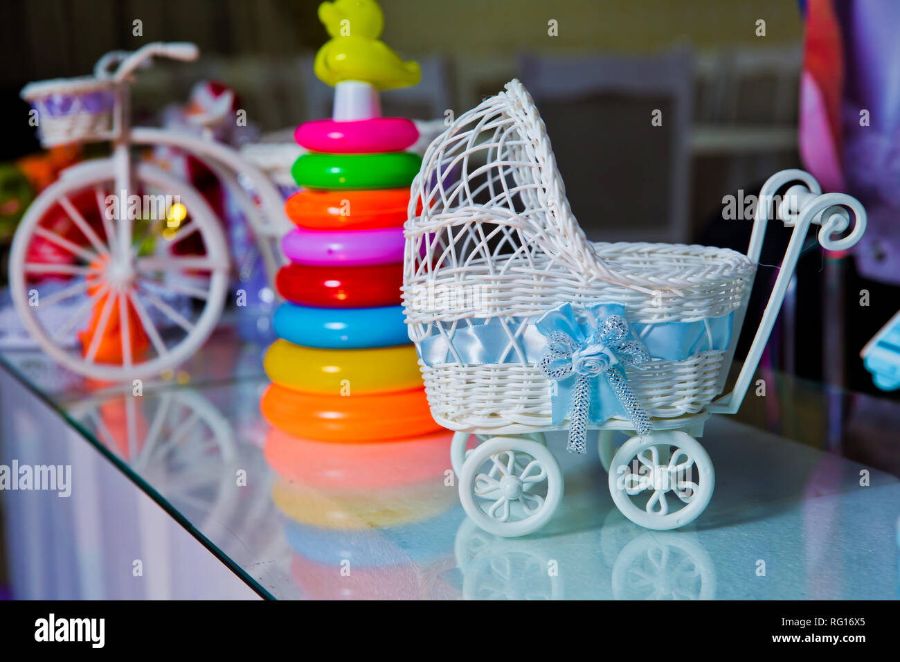 Toy for decoration pink stroller. a small figure of an jewelry box ...