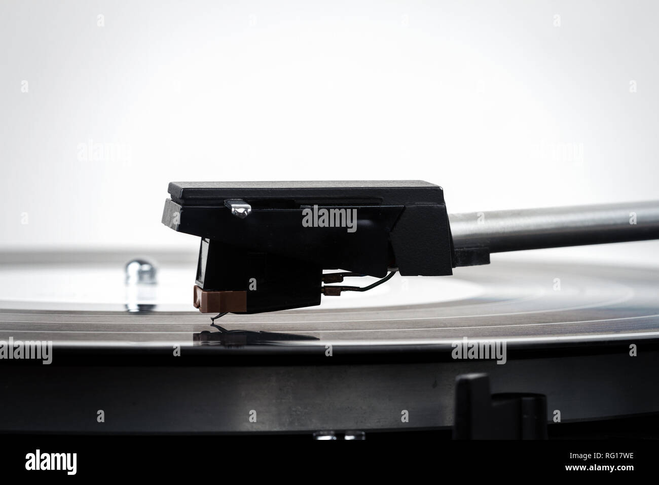 Close up of turntable needle on a vinyl record. Turntable playing vinyl ...