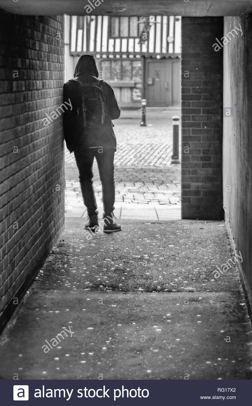 Silhouette Man Leaning Against Wall Stock Photos & Silhouette Man ...