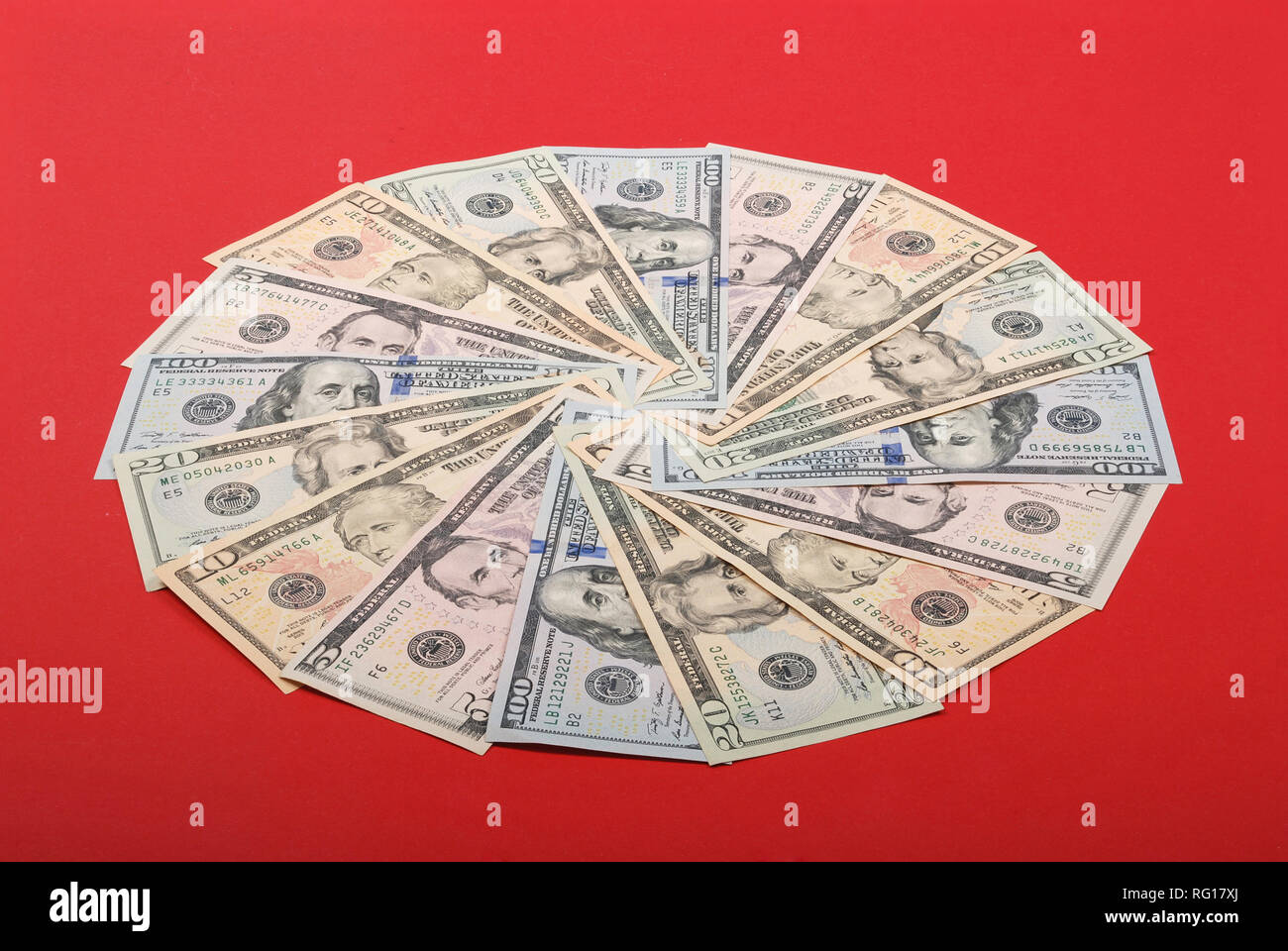 Money in the shape of a circle isolated on red background Stock Photo ...