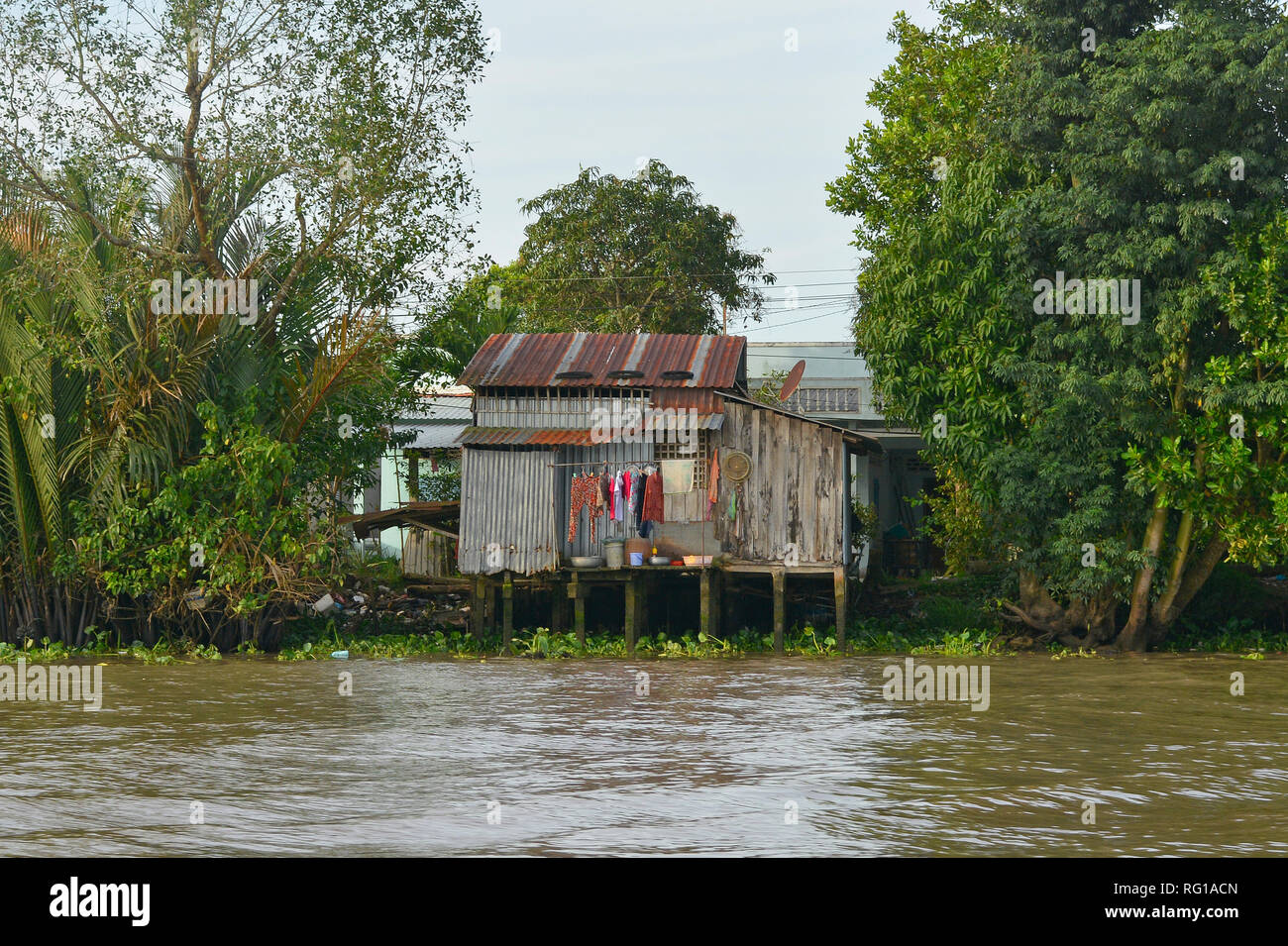 A small stilt house which look out onto a waterway near Can Tho in the ...