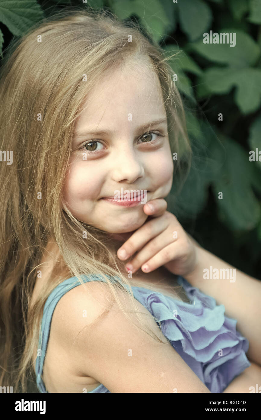Cute little girl smiling in park, beauty, summer Stock Photo - Alamy