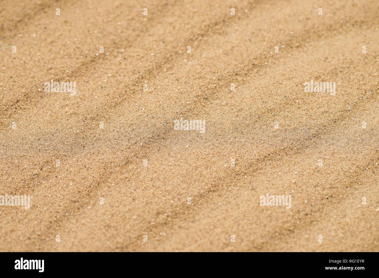 Diagonal waves of sand. Sandy texture background Stock Photo - Alamy
