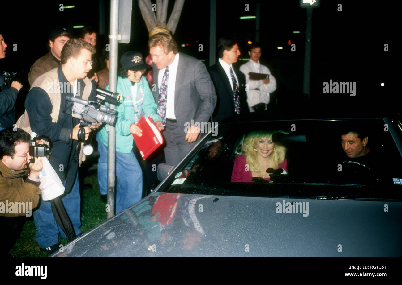 BEVERLY HILLS, CA - NOVEMBER 22: Singer Dolly Parton and manager ...