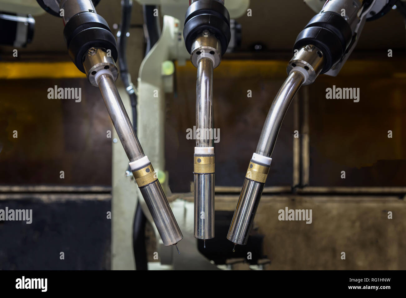 Team robots welding are standby in assembly line Stock Photo - Alamy