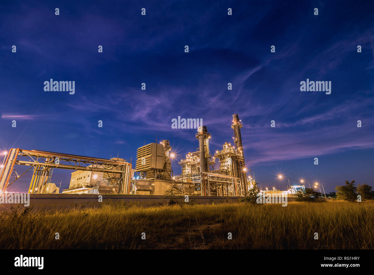 Gas turbine electric power plant at night Stock Photo - Alamy