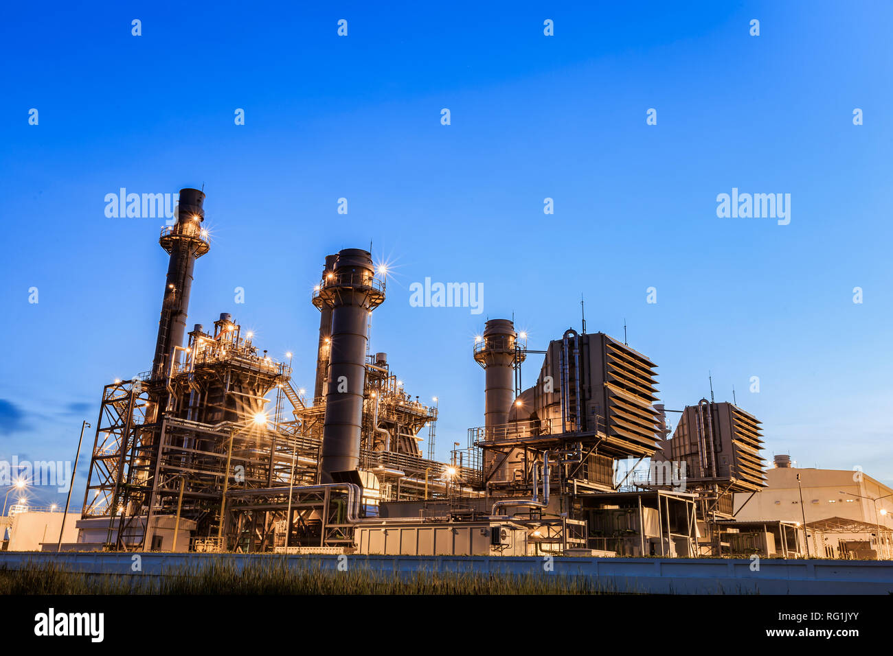Gas turbine electric power plant at night Stock Photo - Alamy