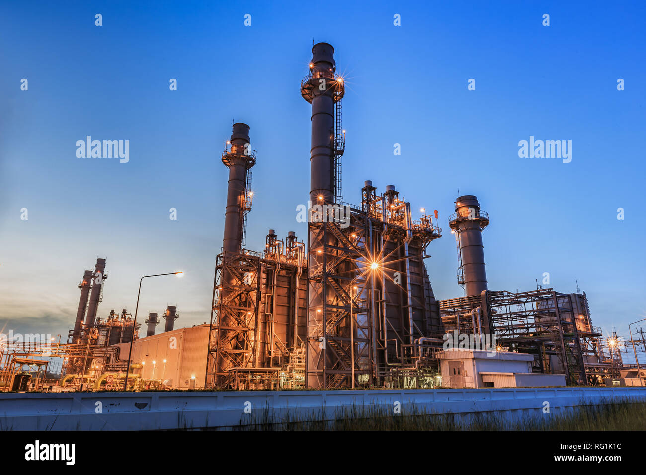 Gas turbine electric power plant at night Stock Photo - Alamy