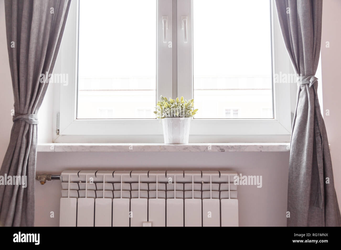 Window and radiator in room Stock Photo - Alamy
