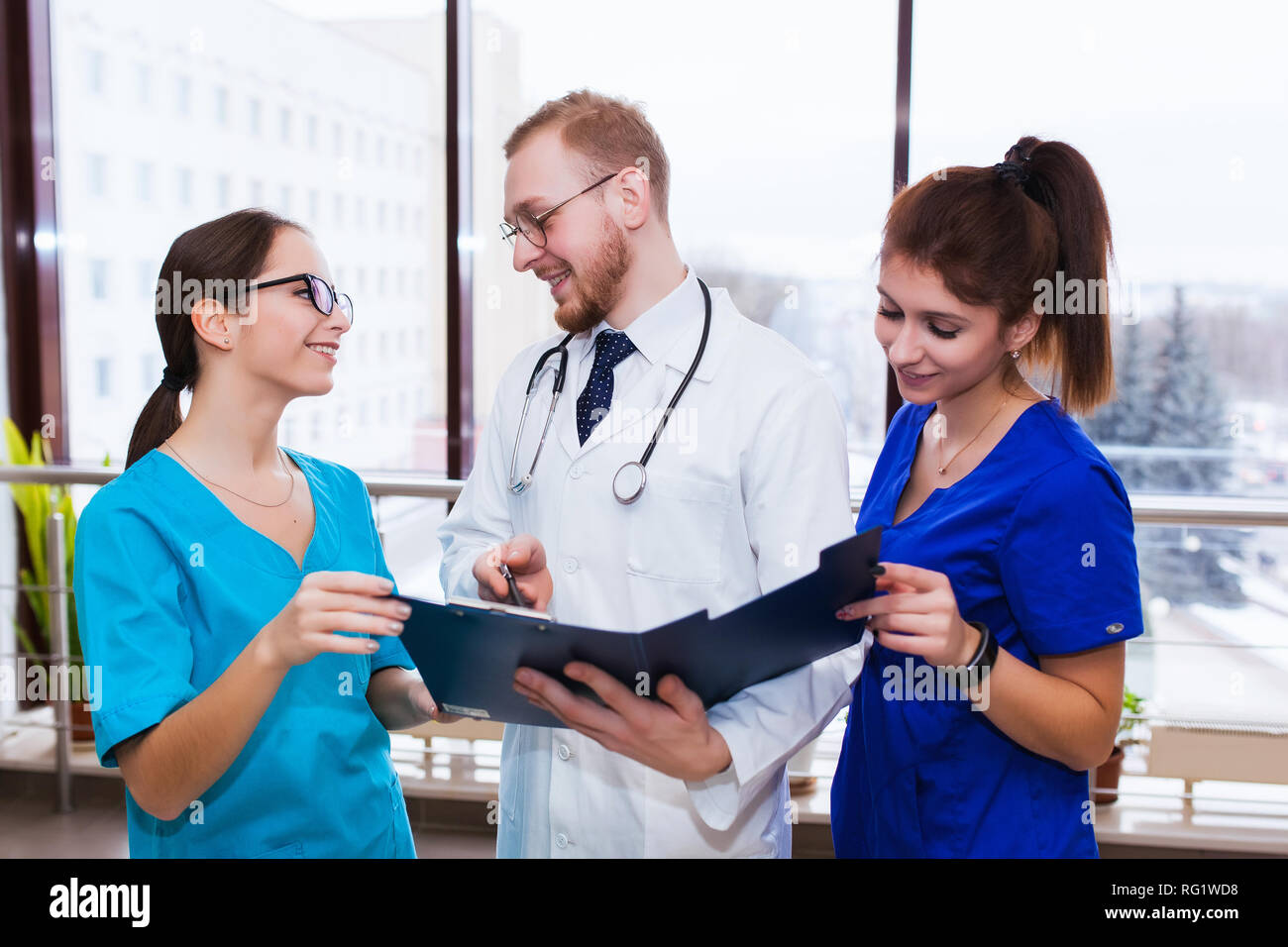 healthcare. A group of student medical students communicates in front ...